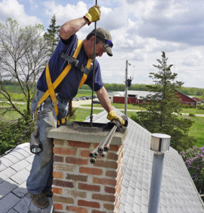 What Can I Do To Stop Debris From Falling Down My Chimney?